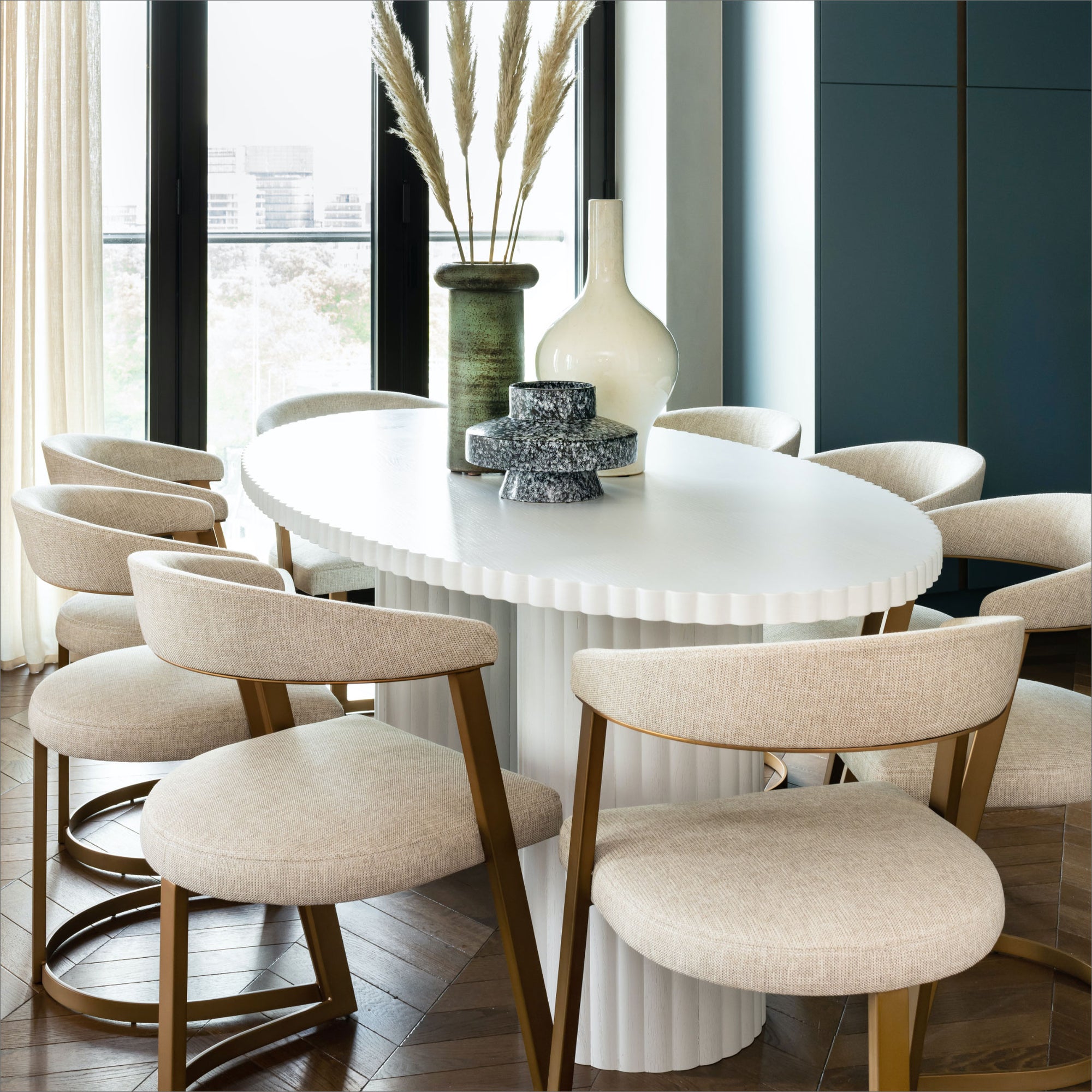 Bow Street, Luxury white oval dining table with ribbed column legs